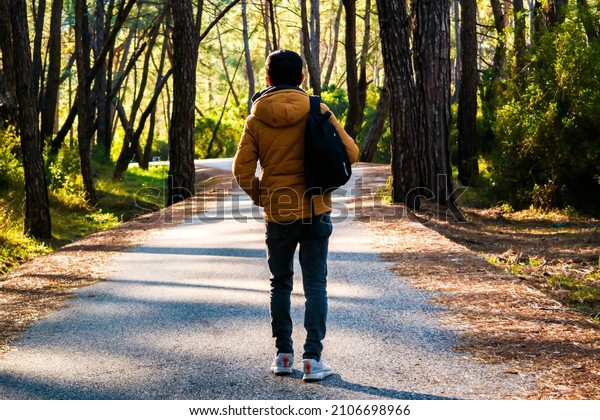 Man Walking On Walking Path Stock Photo 2106698966 | Shutterstock