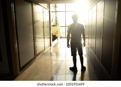 Man Walks Down Corridor Back View Stock Photo 2201931699 | Shutterstock