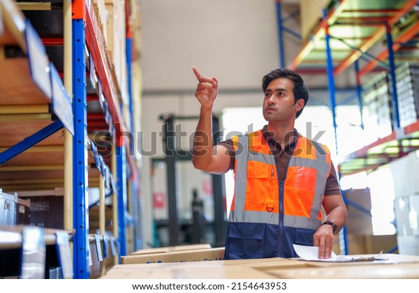 Man Warehouse Worker Checking Goods Supplies Stock Photo 2154643953 ...