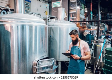 Man Worker Brewery Using Brewing Equipment Stock Photo 2158575029 ...