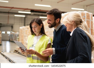 Managers Checking List Products Stock Photo (Edit Now) 1654522075