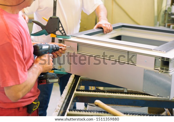 Manufacturing Worker Assembles Pvc Window Factory Stock Photo ...