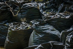 Garbage bags containing rubbish, plastic, and trash, an Abstract Photo ...