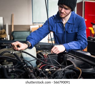 Mechanic Checking Car Engine Stock Photo 566790091 | Shutterstock