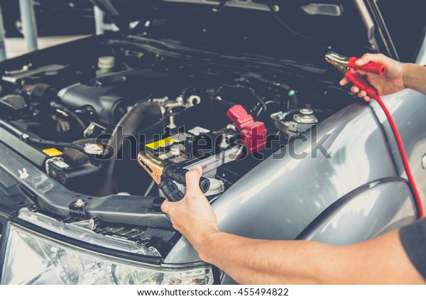 Mechanic Using Jumper Cables Startup Car Stock Photo 455494822 ...