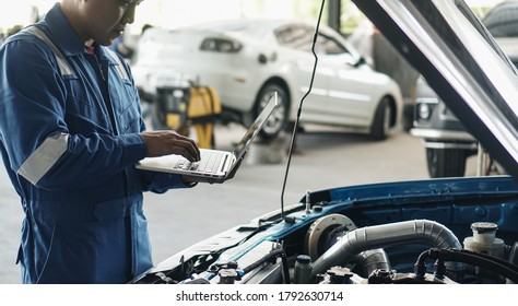 Mechanic Using Laptop Computer Working Tuning Stock Photo 1792630714 ...