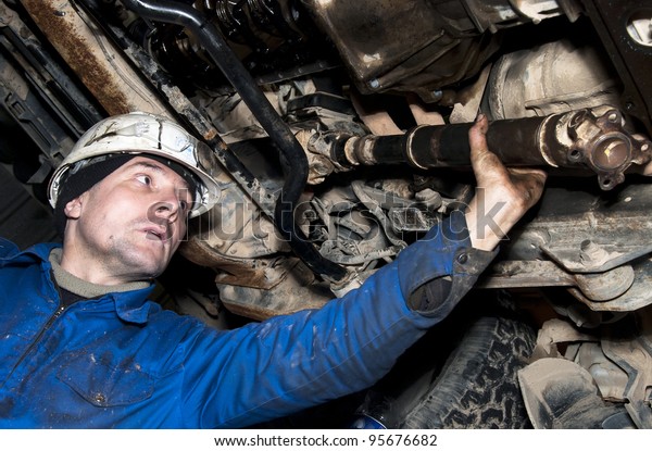 Mechanic Working On Broken Down Vehicle Stock Photo 95676682 | Shutterstock