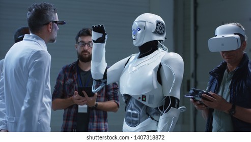 Medium Shot Scientists Testing Humanoid Robots Stock Photo 1407318872 ...