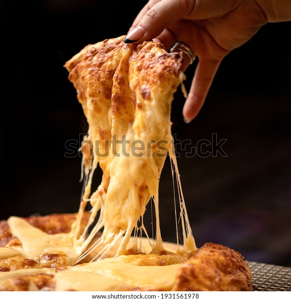 Melted Cheese Stretches On Slice Hot Stock Photo (Edit Now) 1931561978 Melted Cheese Stretches On Slice Hot Stock Photo (Edit Now) 1931561978
