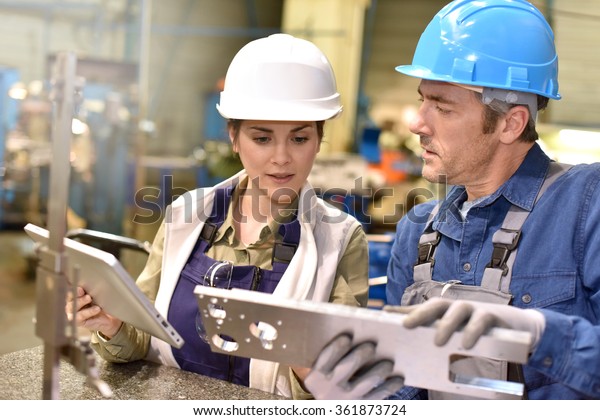 Metallurgy Workers Workshop Using Digital Tablet Stock Photo (Edit Now ...