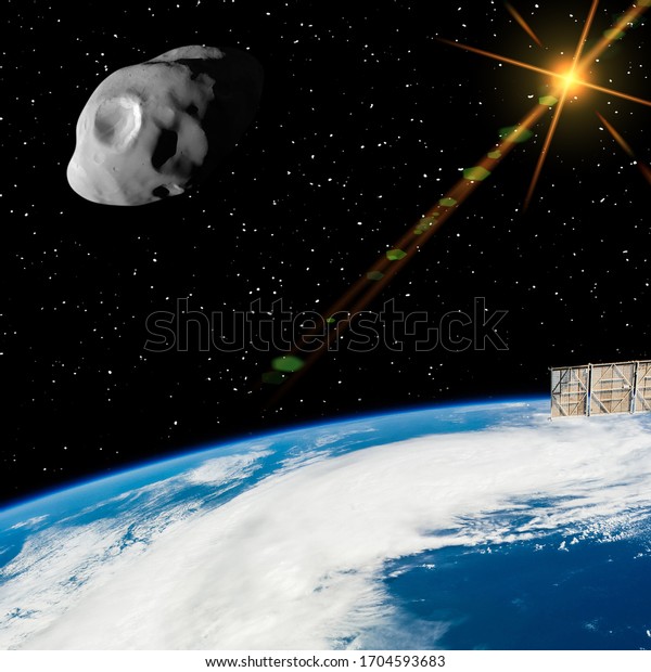 Meteor above the earth. Elements of this image furnished by NASA ...