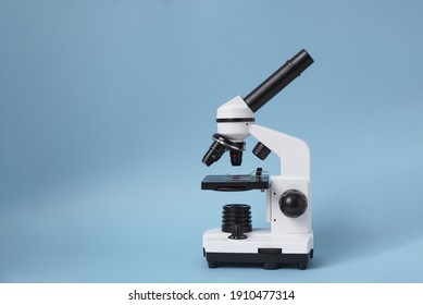 Microscope On Blue Background Stock Photo 1910477314 | Shutterstock