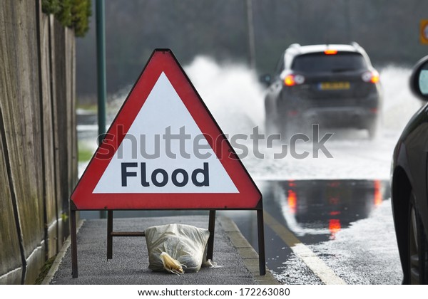 Motorist Driving Through Flood Waters Warning Stock Photo (Edit Now ... Motorist Driving Through Flood Waters Warning Stock Photo (Edit Now ...