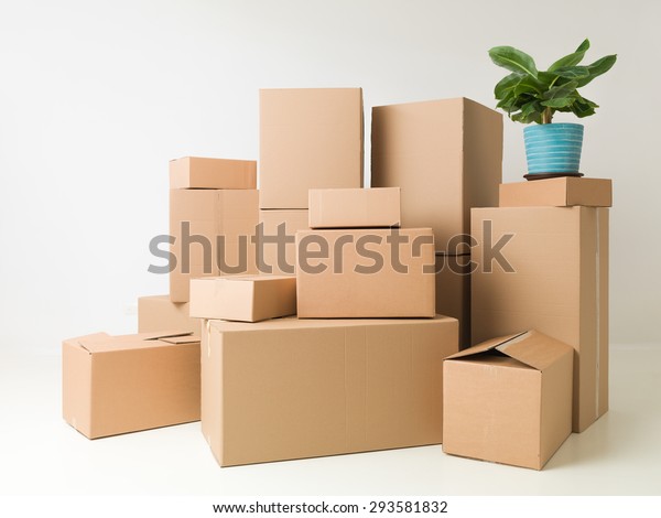 Moving Boxes Stacked Empty Room Ready Stock Photo (Edit Now) 293581832