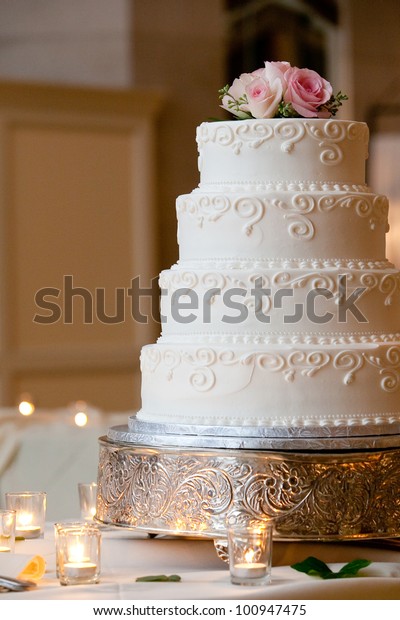 Multi Level White Wedding Cake On Stock Photo (Edit Now) 100947475