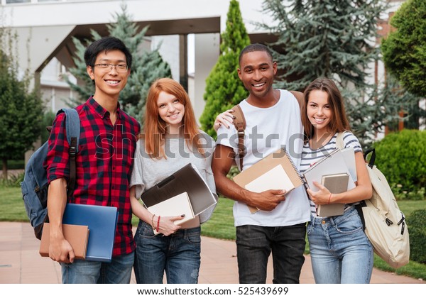 Multiethnic Group Cheerful Young Students Standing : photo de stock ... Multiethnic Group Cheerful Young Students Standing : photo de stock ...