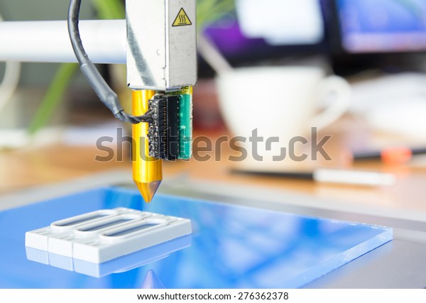 New generation of 3D Printing Machine printing a piece of plastic. For ...