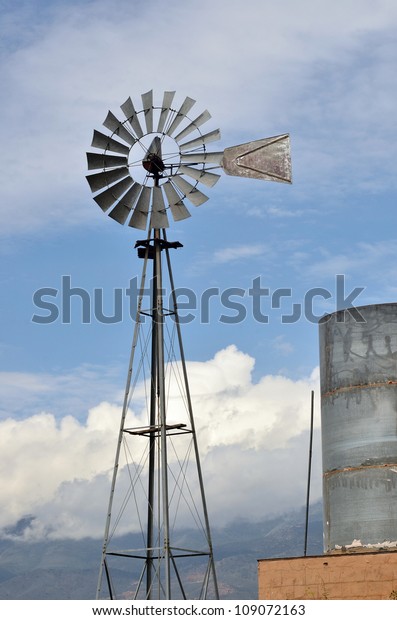 Old Western Windmillworking Windmillrustic Windmill Working Stock Photo ...