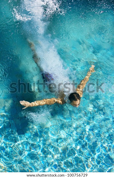 Over Head View Man Diving Into Stock Photo (Edit Now) 100756729