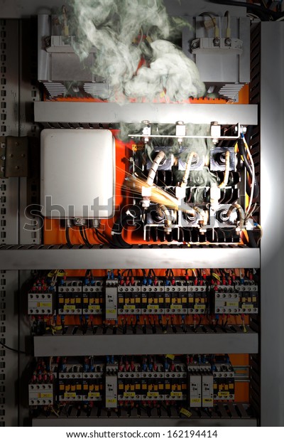 Overloaded Electrical Circuit Causing Electrical Short Stock Photo ...