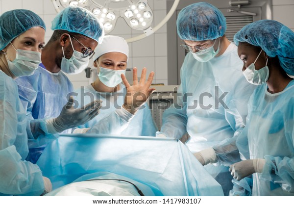 Patient Getting Upwhile Surgeons Making Small Stock Photo 1417983107 ...