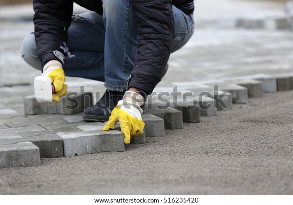 Paving Stone Worker Putting Down Pavers Stock Photo (Edit Now) 516235420 Paving Stone Worker Putting Down Pavers Stock Photo (Edit Now) 516235420