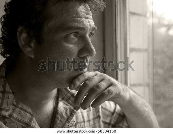 Pensive Man Looking Out Window Stock Photo (Edit Now) 58334158
