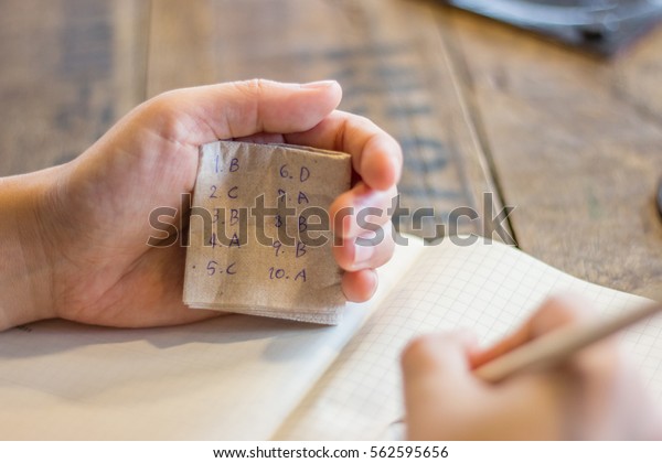 People Cheating Test Answer Piece Paper Stock Photo (Edit Now) 562595656