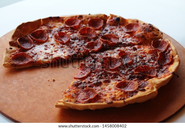 Pepperoni Pizza One Slice Missing Stock Photo 1458008402 | Shutterstock