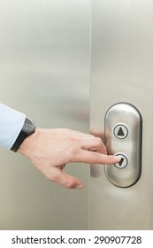 Person Pushing Down Arrow Elevator Button Stock Photo 290907728 ...