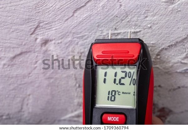 Plaster Moisture Measurement Using Electronic Meter Stock Photo ...