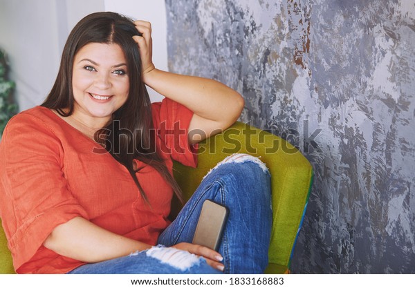 Plus Size Model Sitting On Chair Stock Photo 1833168883 | Shutterstock
