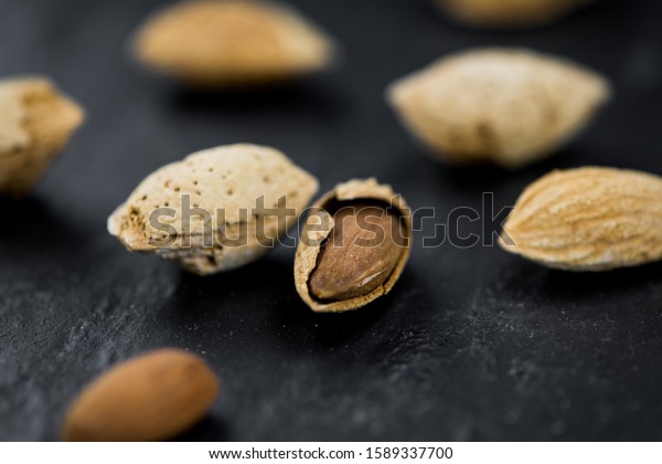 Portion Roasted Almonds Shell On Dark Stock Photo 1589337700 | Shutterstock
