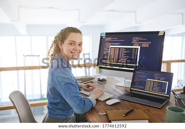 Portrait Female Developer Smiling Camera While Stock Photo (Edit Now ... Portrait Female Developer Smiling Camera While Stock Photo (Edit Now ...