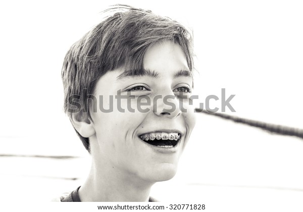 Portrait Laughing Teenage Boy Brace Stock Photo (Edit Now) 320771828 Portrait Laughing Teenage Boy Brace Stock Photo (Edit Now) 320771828