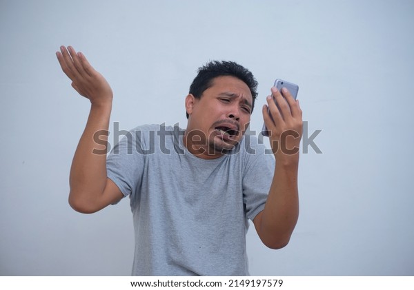 Portrait Man Cry While Looking Phone Stock Photo 2149197579 | Shutterstock