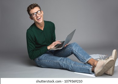 Man Sitting On Floor Holding Book Stock Photo 432494014 | Shutterstock