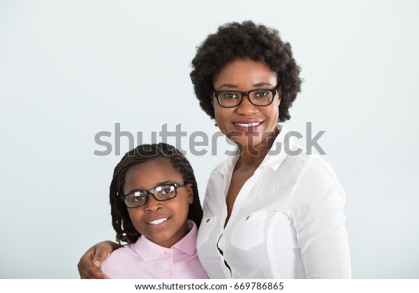 Portrait Smiling Daughter Mother Eyeglasses Against Stock Photo ... Portrait Smiling Daughter Mother Eyeglasses Against Stock Photo ...