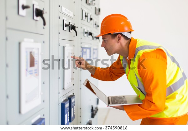Power Company Technical Worker Using Laptop Stock Photo 374590816 ...