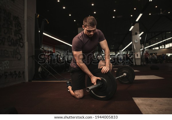 Professional Athlete Adding Weights On His Stock Photo 1944005833 ...