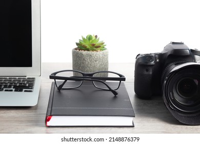 Professional Camera On Work Table Laptop Stock Photo 2148876379 ...