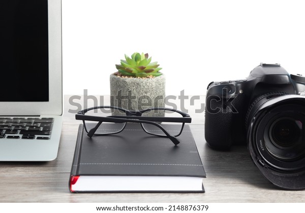 Professional Camera On Work Table Laptop Stock Photo 2148876379 ...