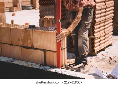 Professional Construction Worker Adjusting Bricks Mortar Stock Photo ...