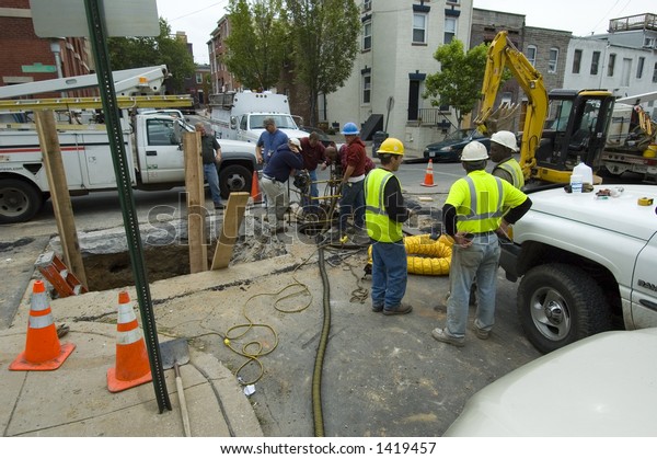 Pulling Cable Through Manhole Stock Photo (Edit Now) 1419457