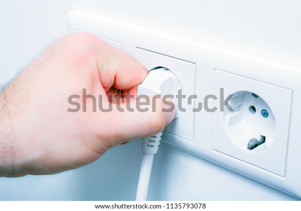 Pulling Electrical Plug Out Wall Socket Stock Photo 1135793078 ...