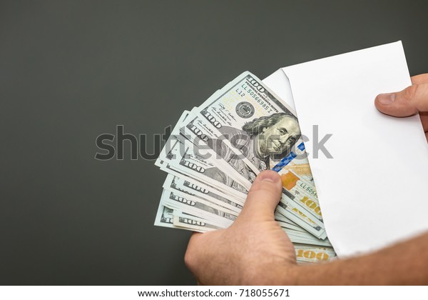 Pulling Money Out Envelope Stock Photo (Edit Now) 718055671