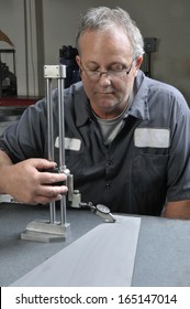 Quality Inspector Using Precision Measuring Gauge Stock Photo 165147014 ...
