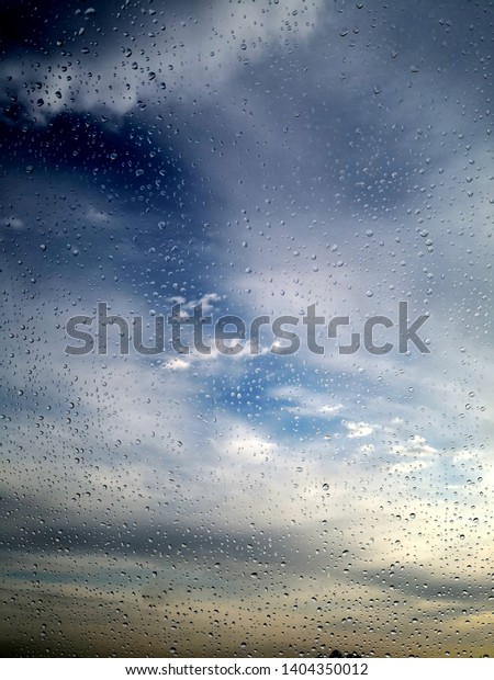 Rain Clearing Window Droplets Background Stock Photo 1404350012 ...