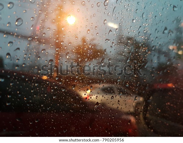 Rain drop on the window in rainy day with traffic jam - Stock Image ...