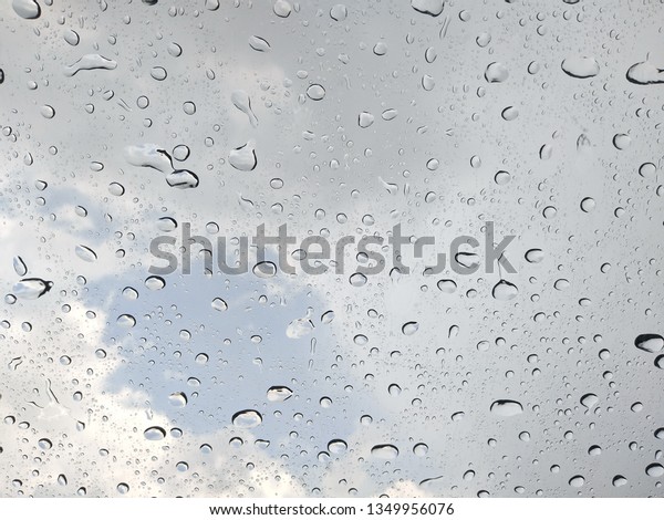 Raindrop On Car Windshield Cloud Blue Stock Photo 1349956076 | Shutterstock